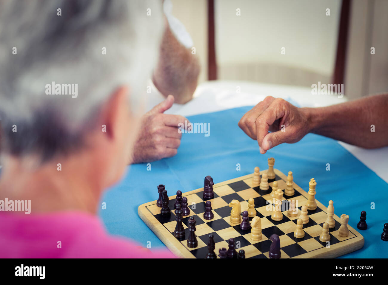 Group of seniors playing chess Stock Photo - Alamy