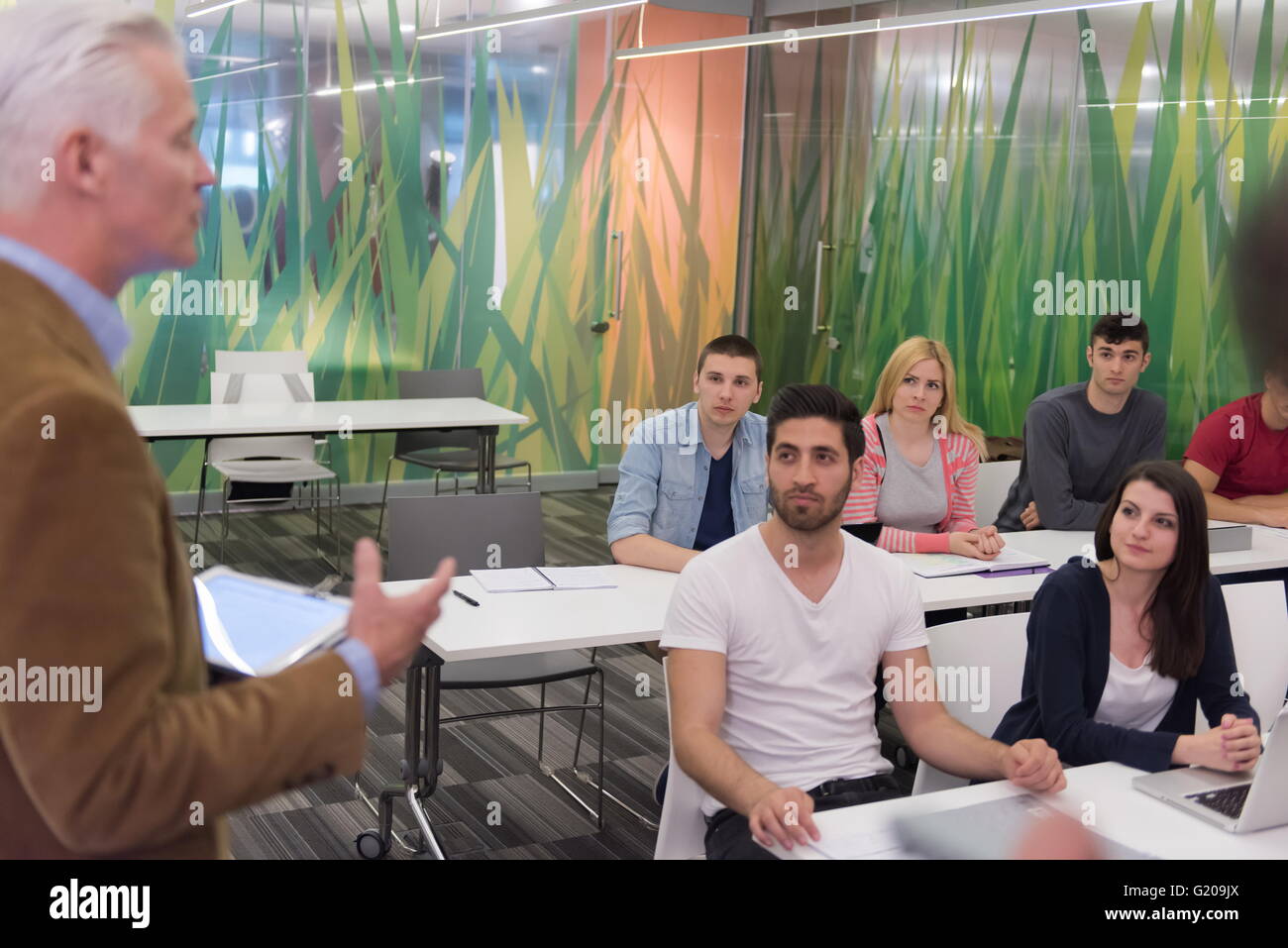group of students study with professor in modern school classroom Stock ...