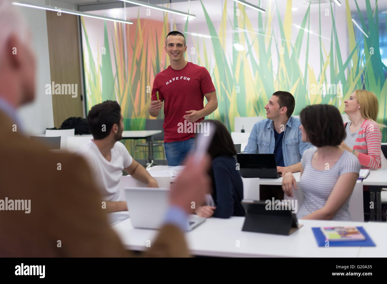 group of students study with professor in modern school classroom Stock ...