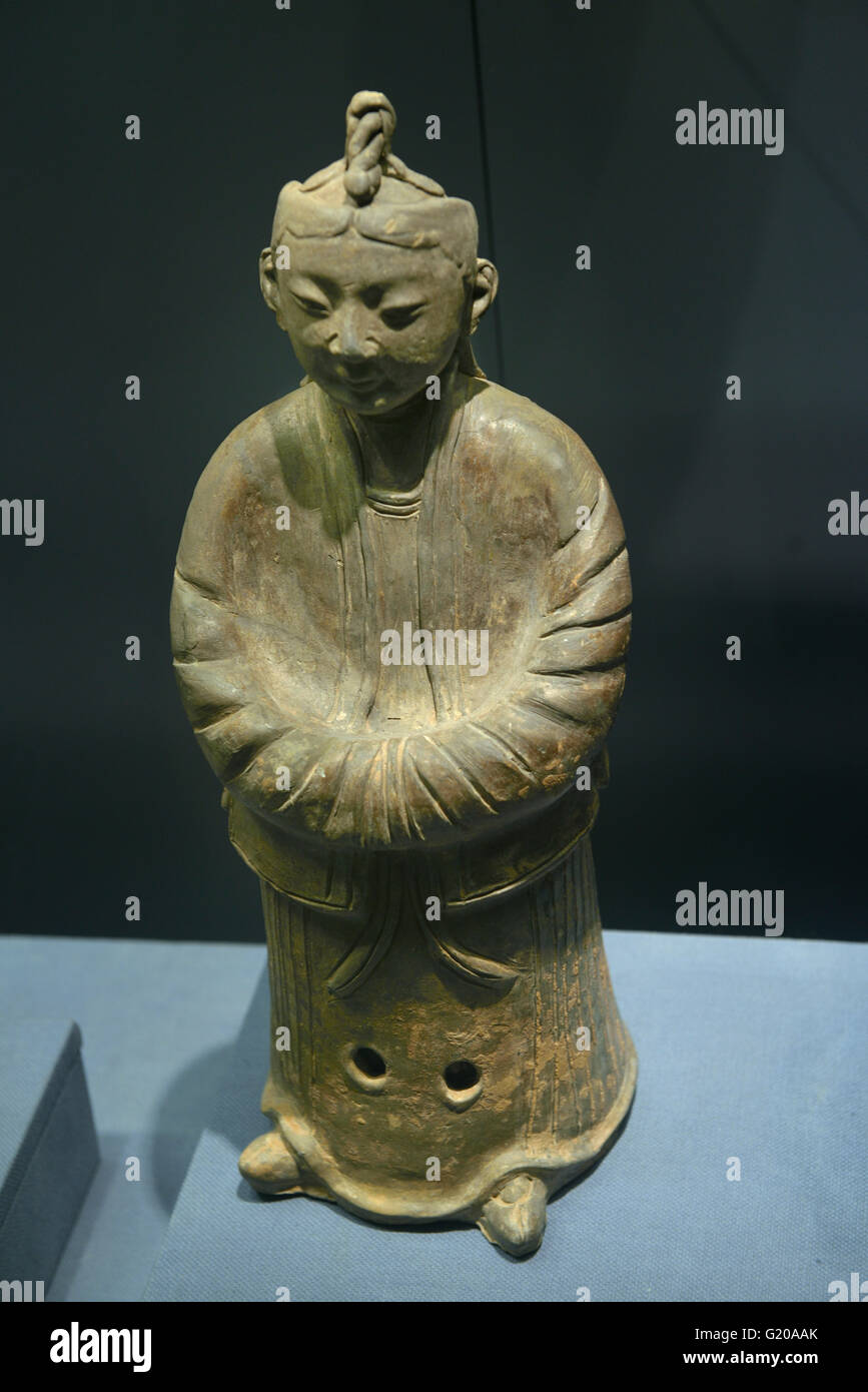 Pottery figurine of Khitan man, unearthed from tombs of the Liao ...