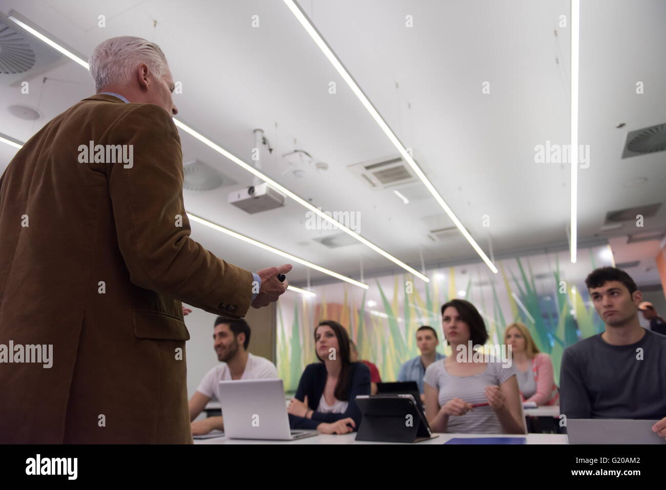 group of students study with professor in modern school classroom Stock ...