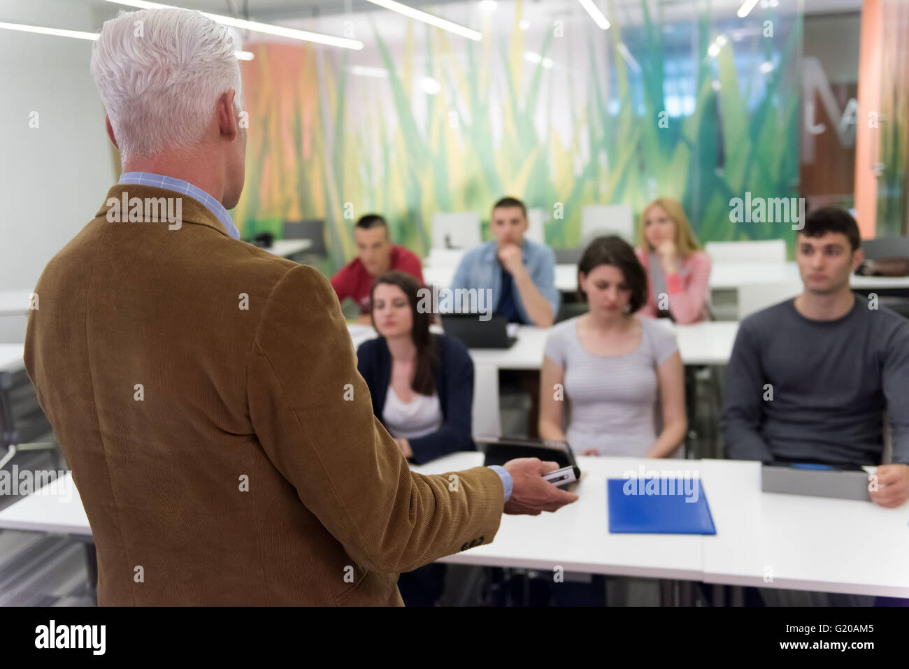 group of students study with professor in modern school classroom Stock ...