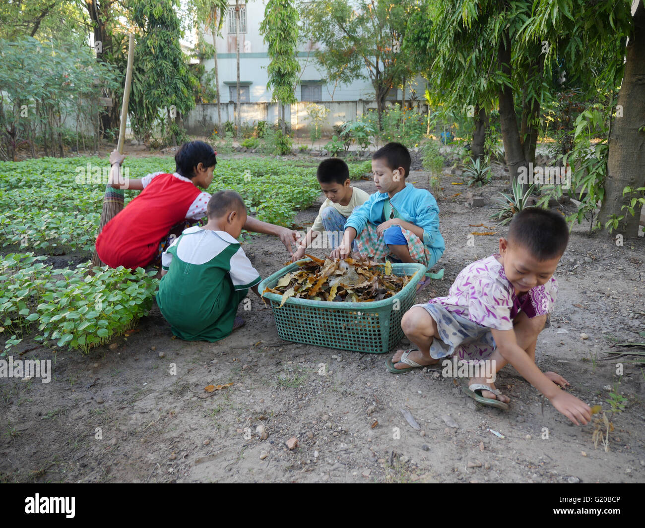 MYANMAR Saint Mary's girls orphanage at Pathein. Girls doing chores ...