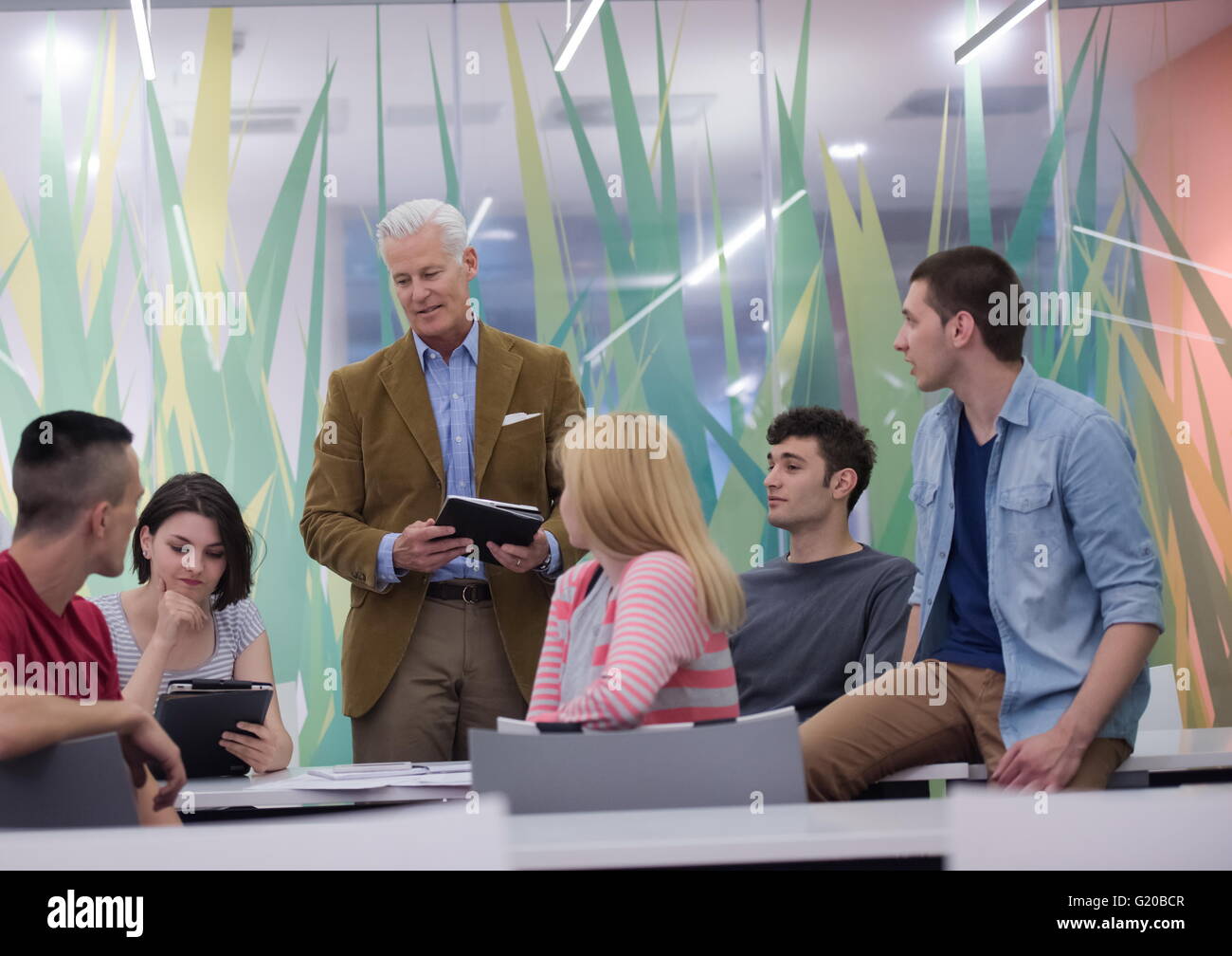 group of students study with professor in modern school classroom Stock ...