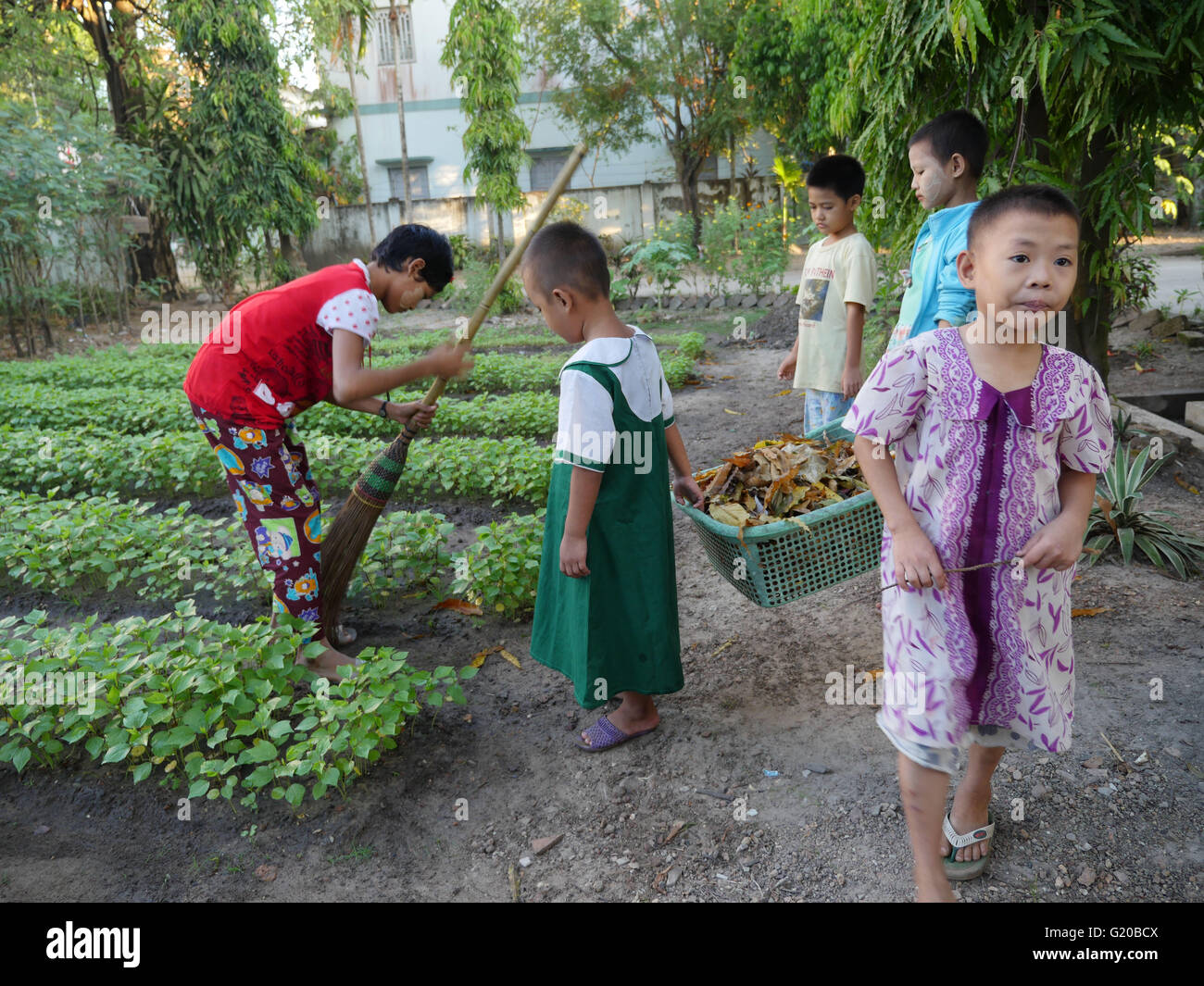 MYANMAR Saint Mary's girls orphanage at Pathein. Girls doing chores ...