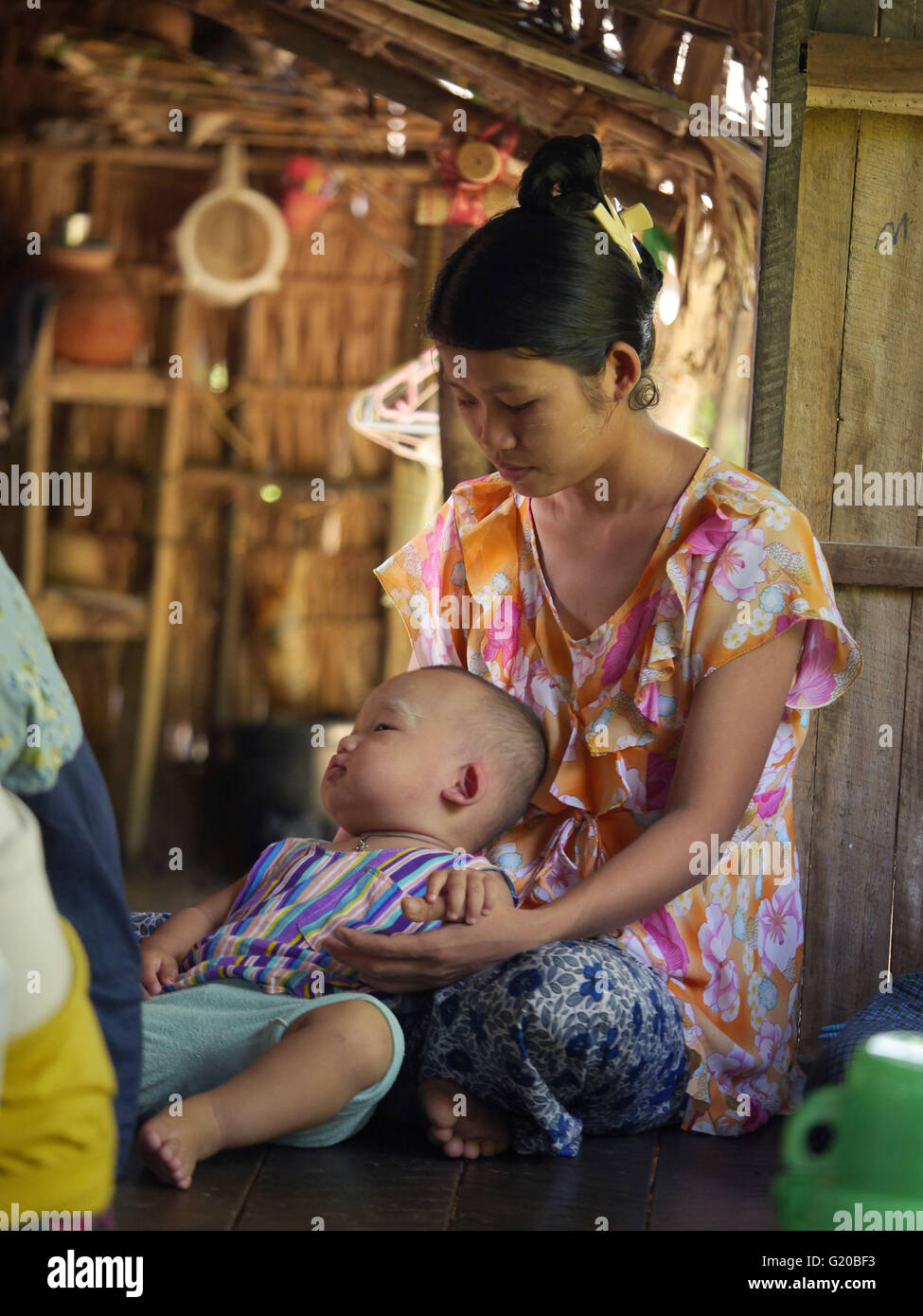 MYANMAR Mother and child Stock Photo - Alamy