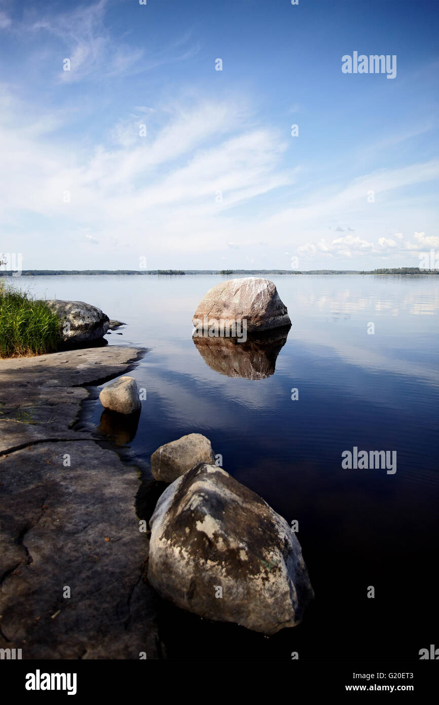 Water landscape with stones. Stones in water. The lake with stones ...
