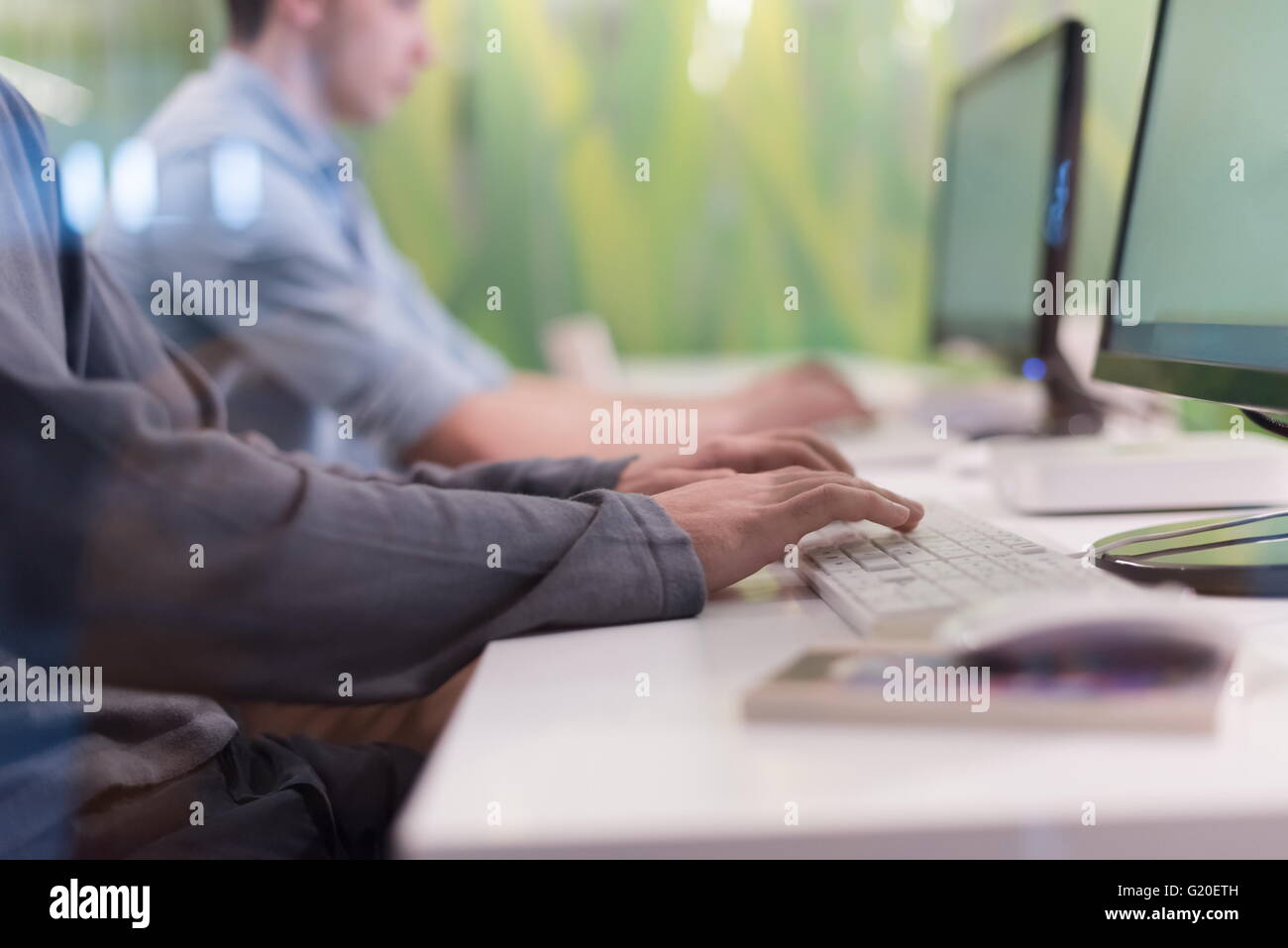 technology students group in computer lab school classroom working on ...