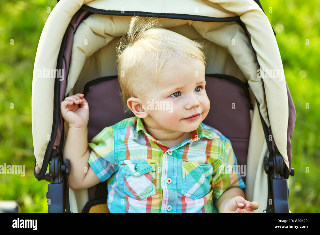 Baby in pram outdoors hi-res stock photography and images - Alamy