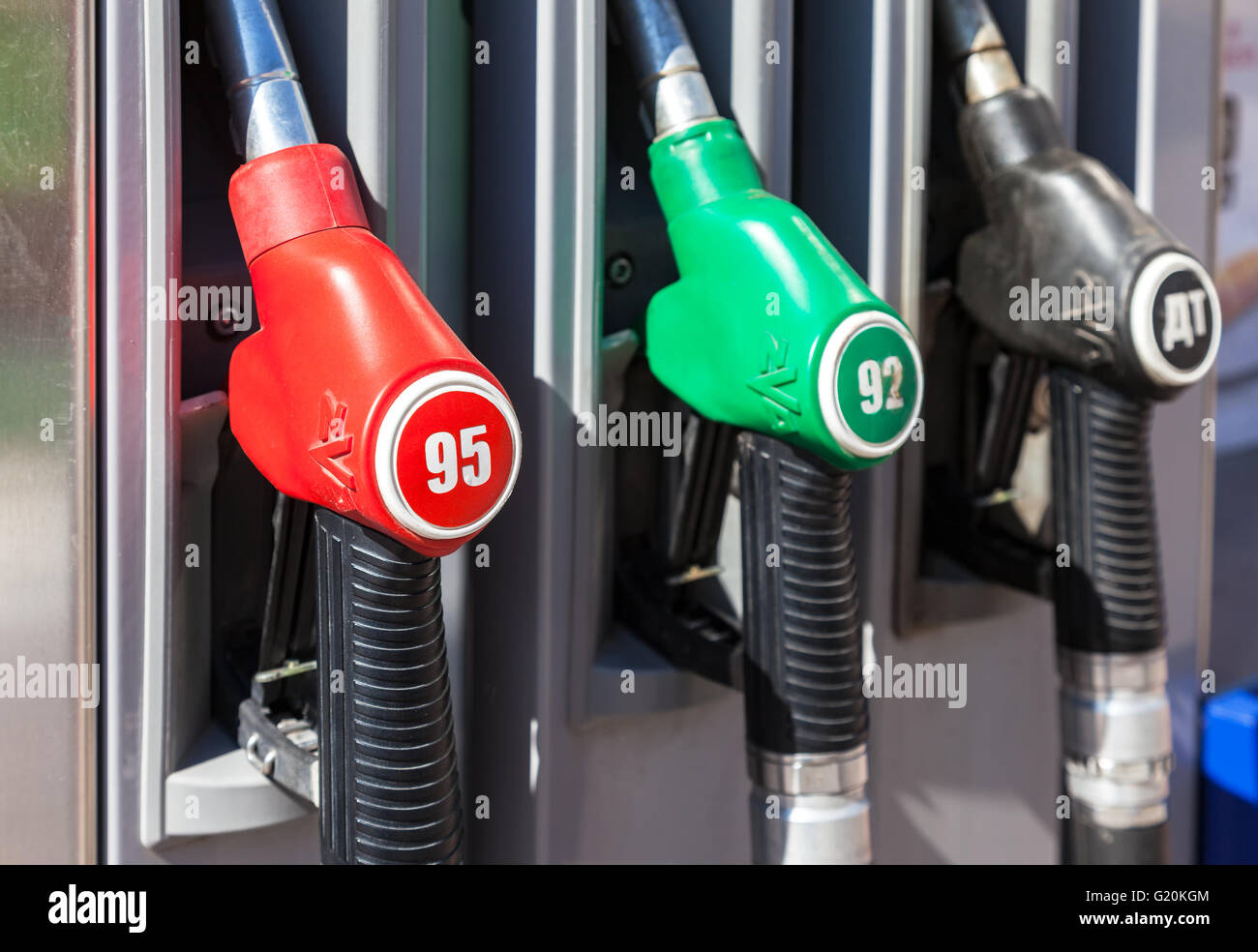 Filling the column with different fuels at the gas station Stock Photo ...