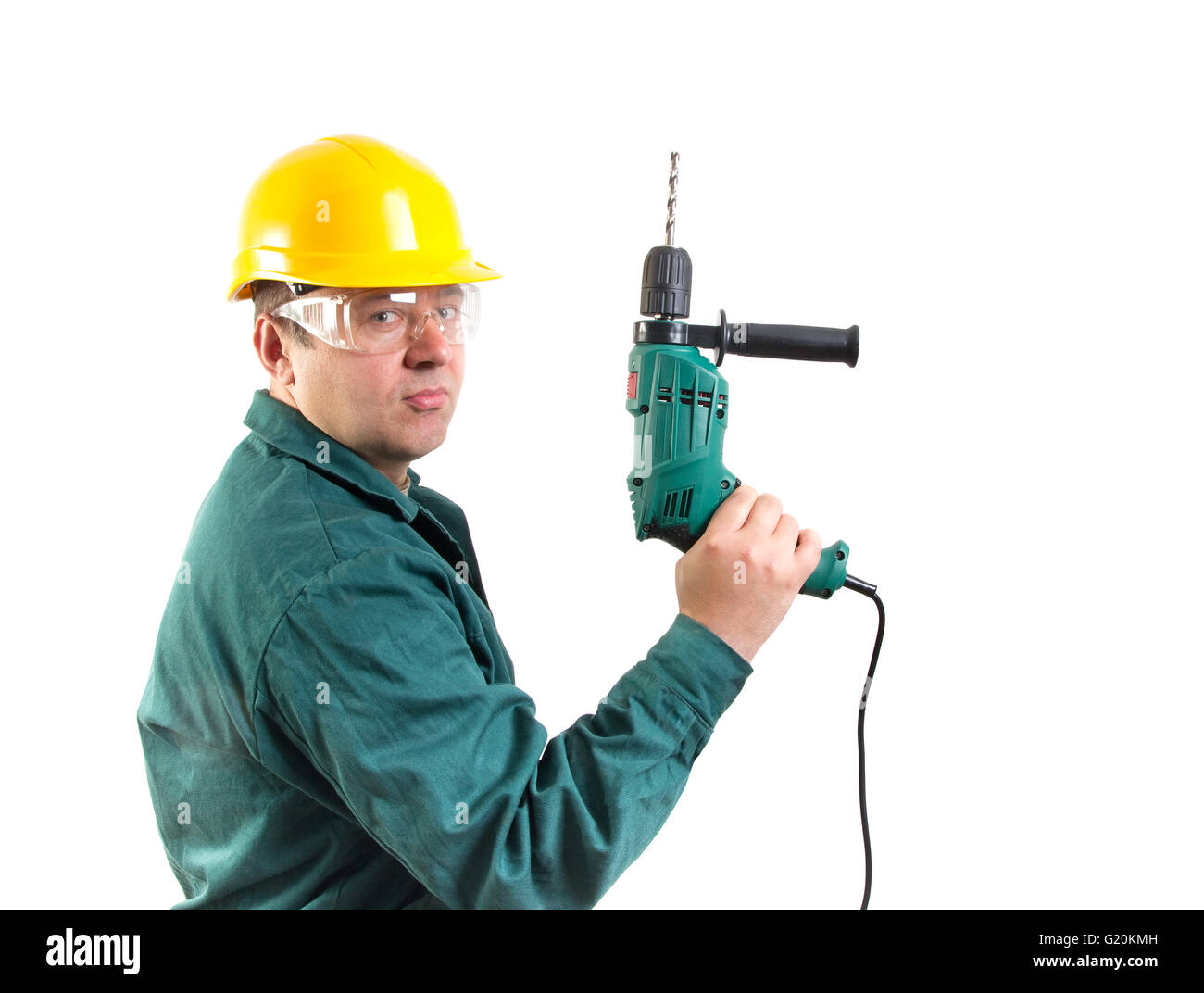 worker hold drill as a gun, clipping path included Stock Photo - Alamy