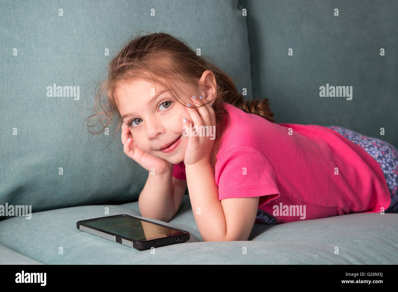 Playing on cell hi-res stock photography and images - Alamy