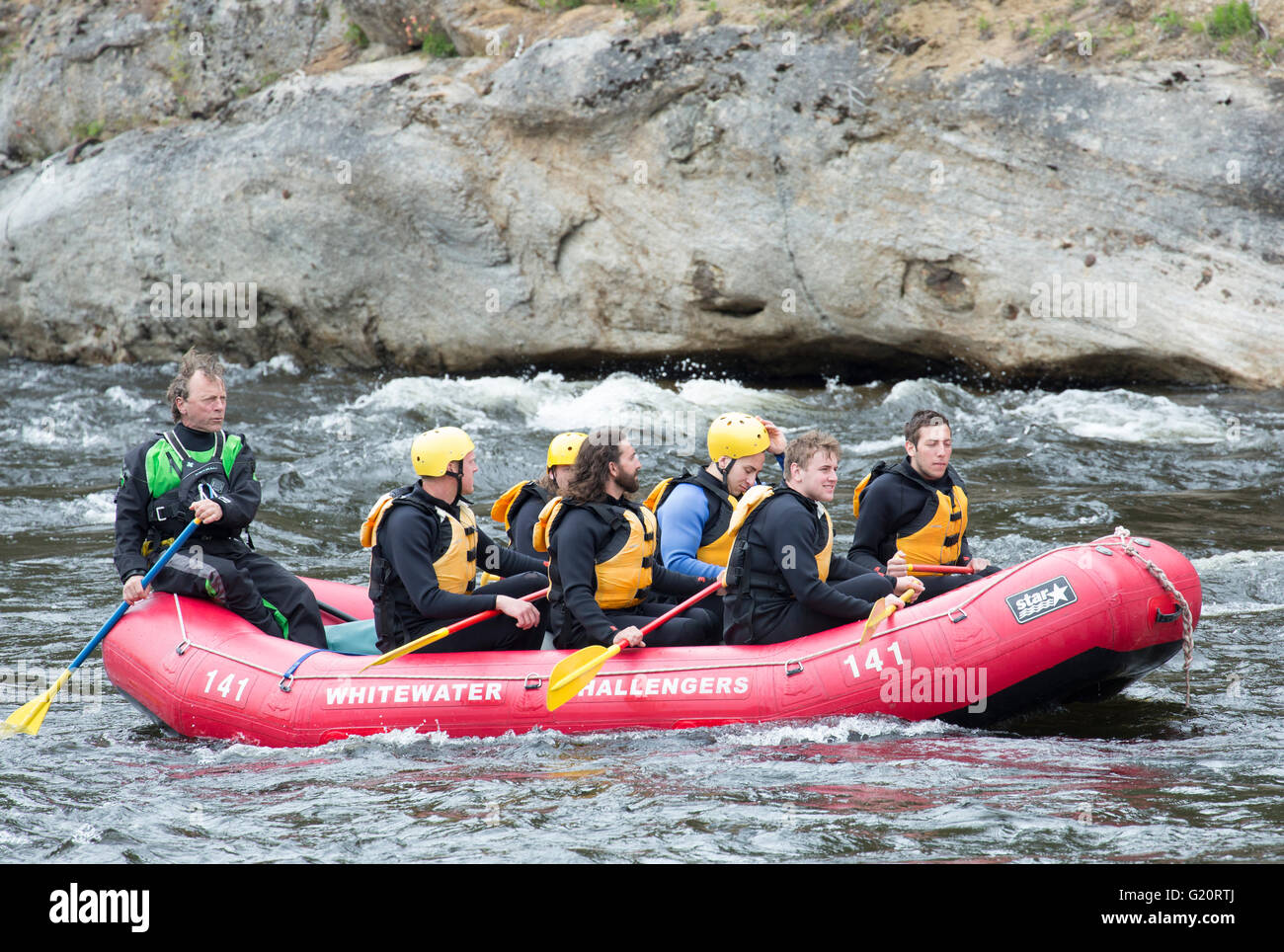 Family and friends on a river rafting trip Stock Photo - Alamy