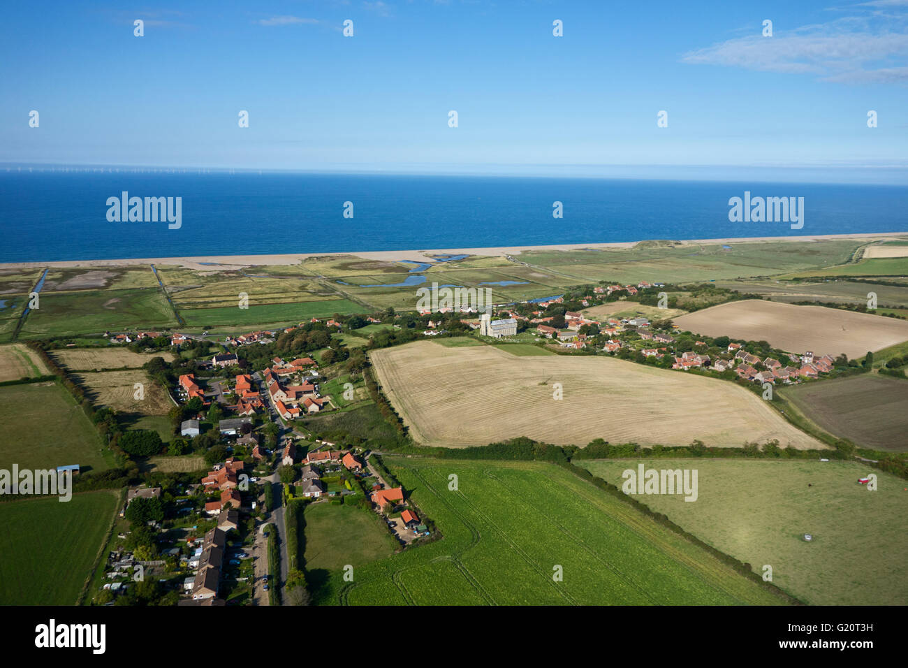 Aerial view of village of Salthouse and coastal marshes North Norfolk ...