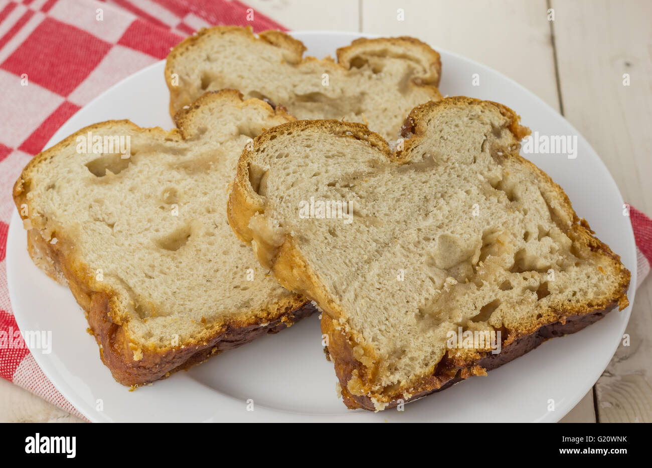 Traditional dutch sugar bread on a white plate Stock Photo - Alamy