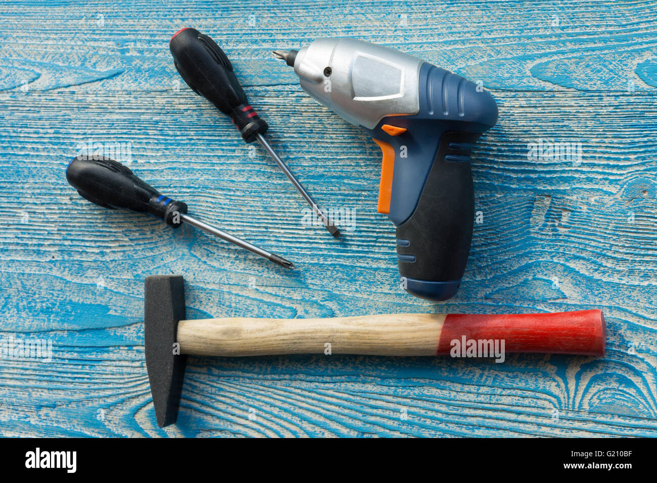 The photo shows the screwdriver and hammer Stock Photo - Alamy