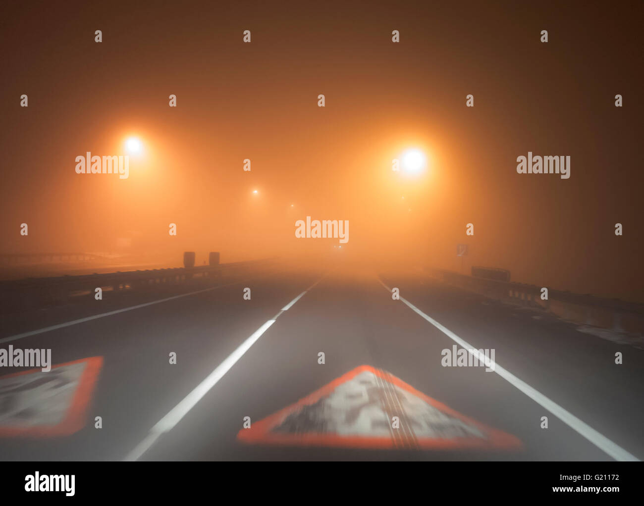 Road in the heavy fog Stock Photo - Alamy