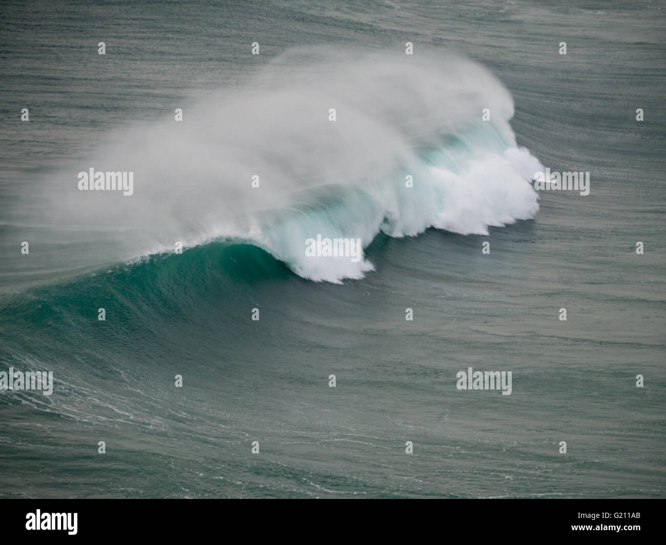 Wave crest in Nazare beach Stock Photo - Alamy