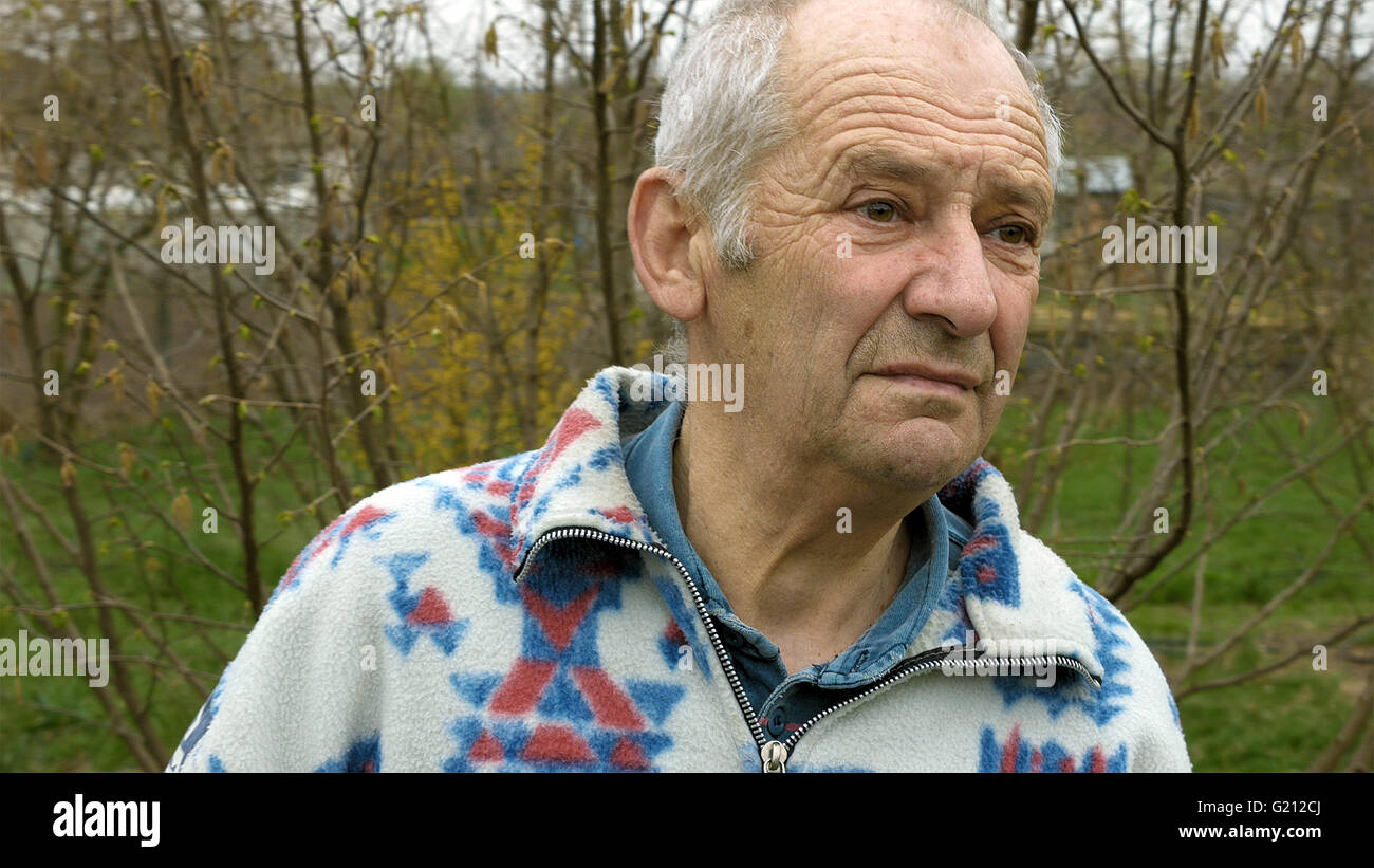 Senior elderly aged old man portrait outdoors Stock Photo - Alamy