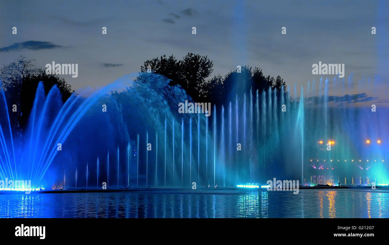 Colorful bright fountain with beautiful reflection Stock Photo - Alamy
