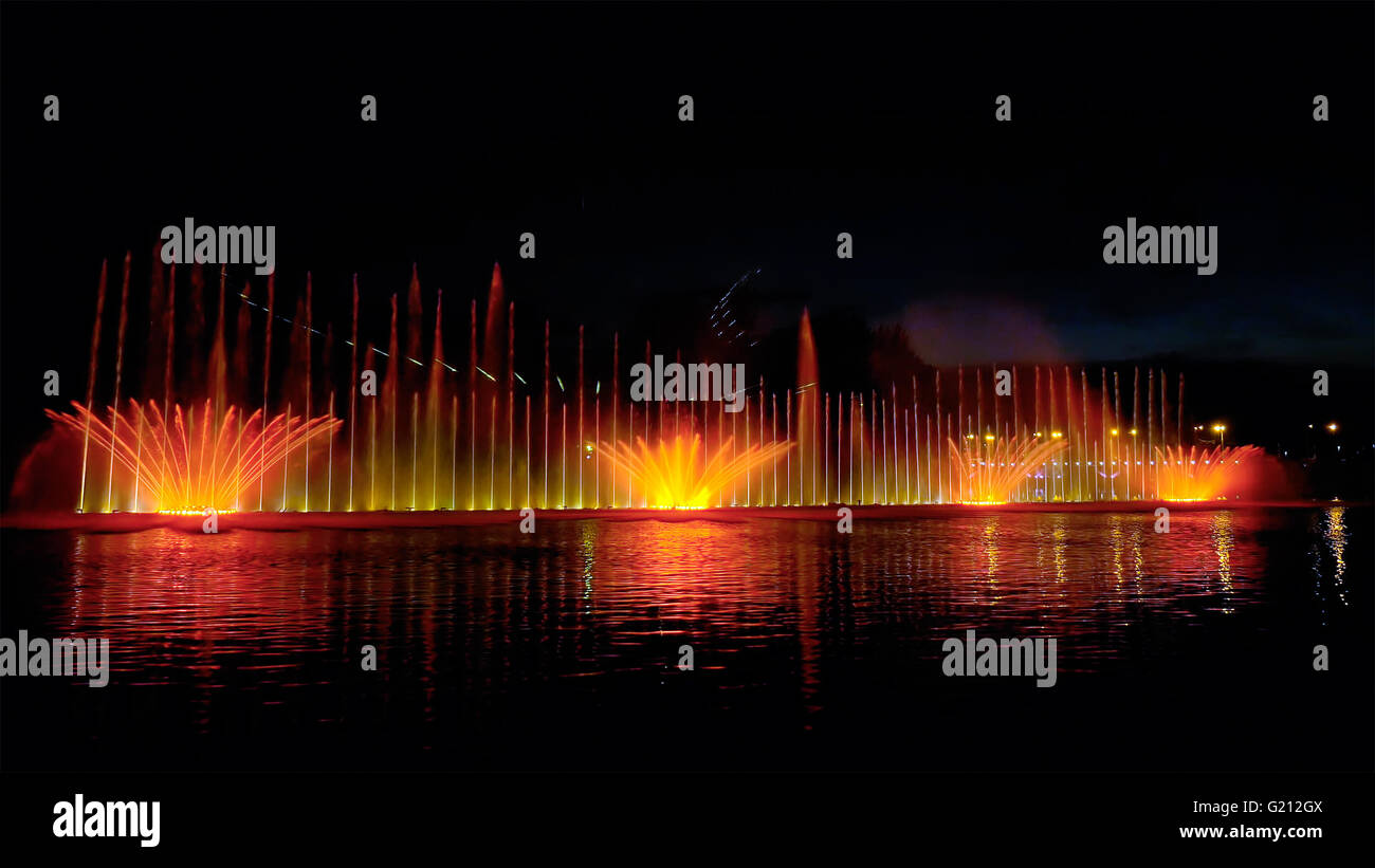 Colorful bright fountain with beautiful reflection Stock Photo - Alamy