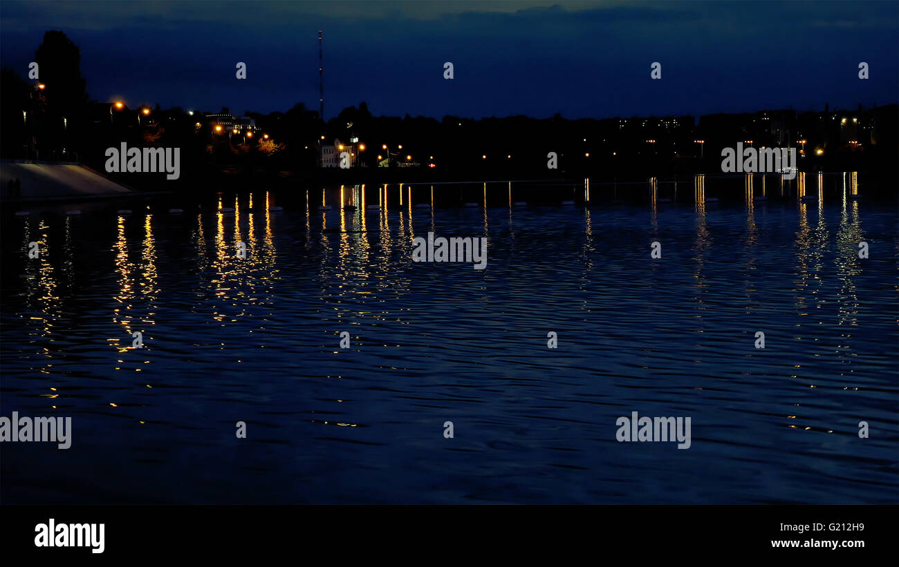 Beautiful lights reflection in water at night Stock Photo - Alamy