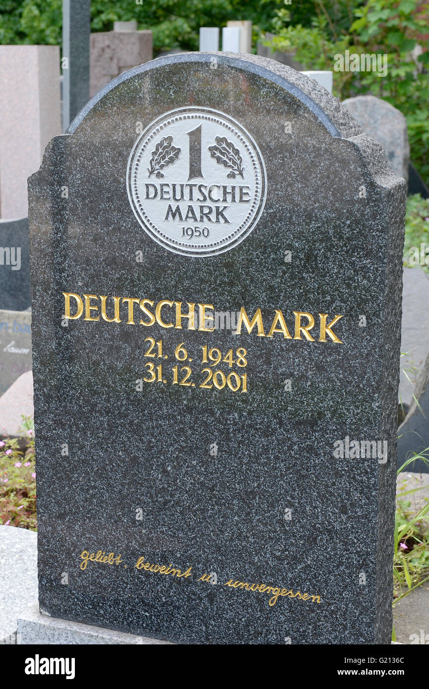 A tombstone for the German Mark currency is on display as a showpiece ...