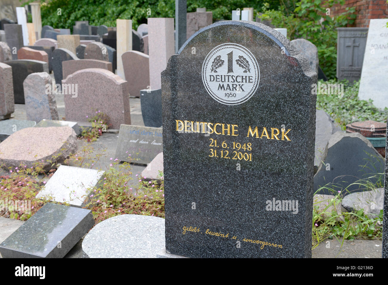 A tombstone for the German Mark currency is on display as a showpiece ...