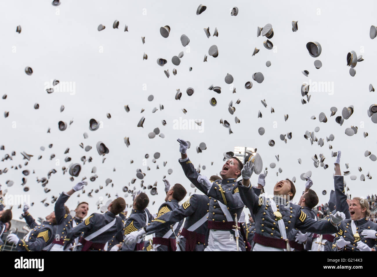 West Point, USA. 21st May, 2016. Cadets toss their hats in the air ...