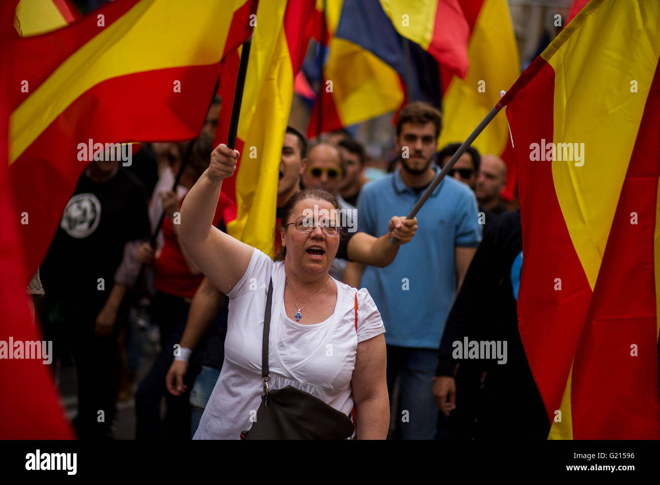 Protesters wave Spanish flags during a march that commemorates the ...