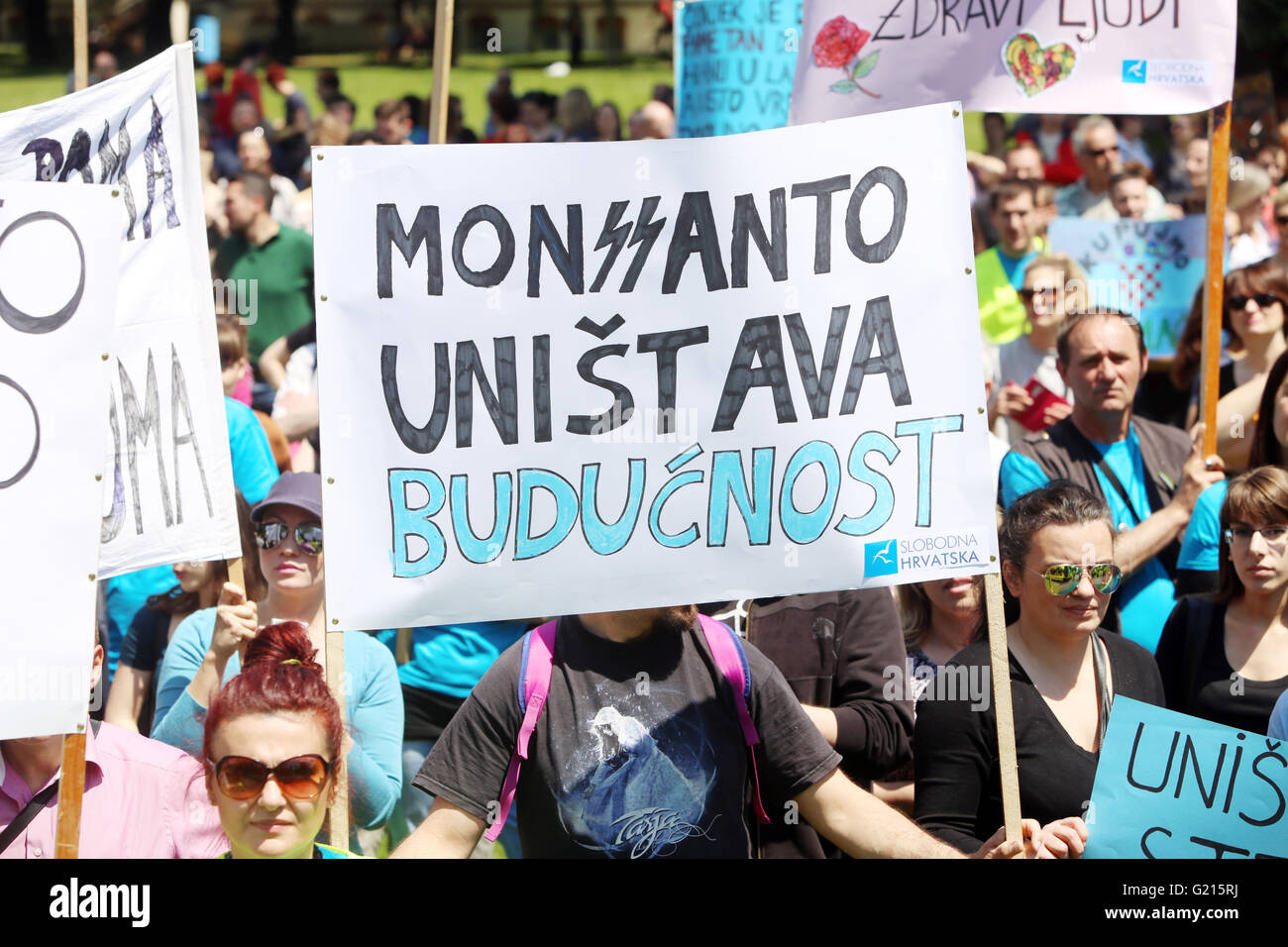 Zagreb, Croatia. 21st May, 2016. : Protesters march with signs raised ...