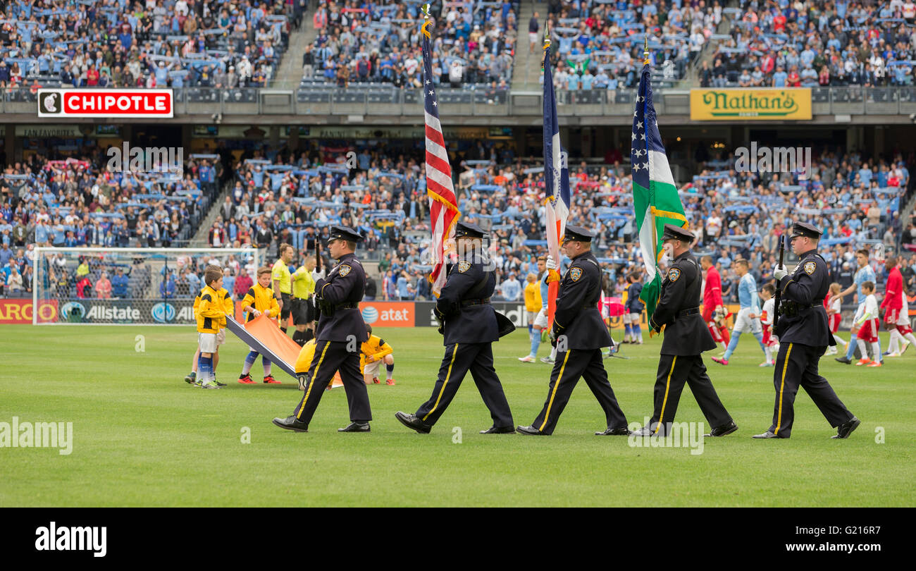 New York, USA. 21st May, 2016. NYPD honor guards enter stadium with ...