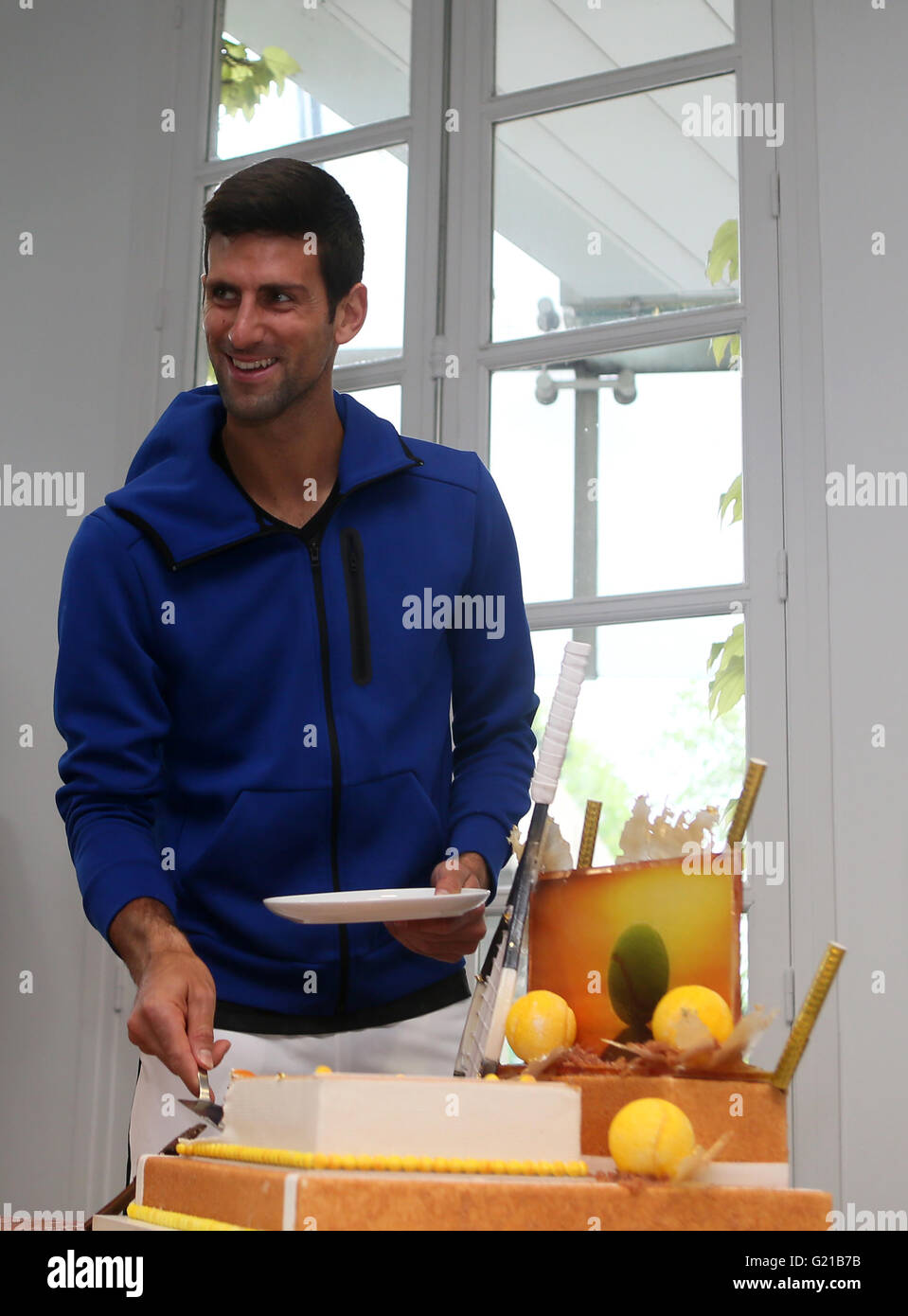 Paris. 22nd May, 2016. Serbia's Novak Djokovic cuts his birthday cake ...