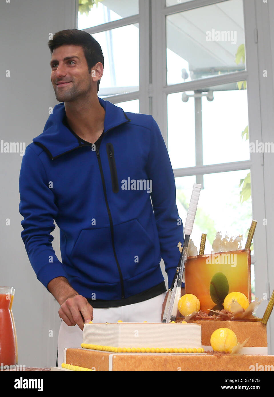Paris. 22nd May, 2016. Serbia's Novak Djokovic cuts his birthday cake ...