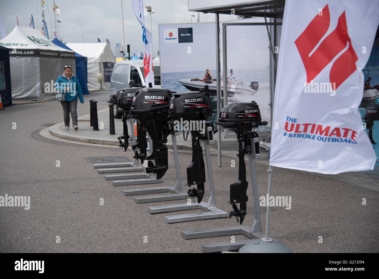 Poole, UK. 22nd May, 2016. A row of boat engines on display at Poole ...