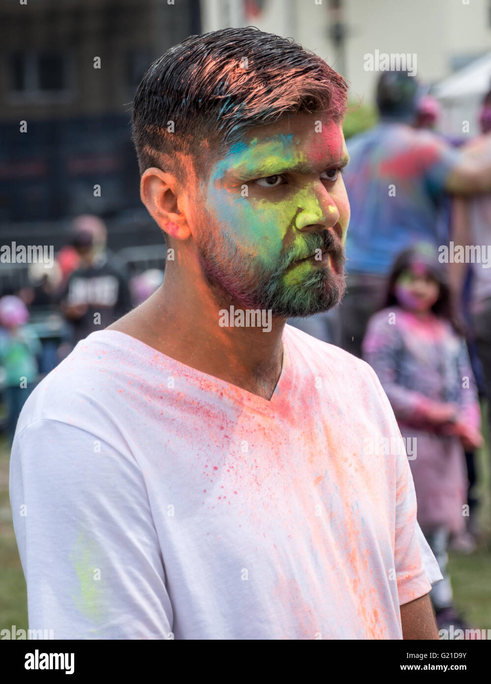 A sad looking man during Holi festival in Malmo. För the first time in ...