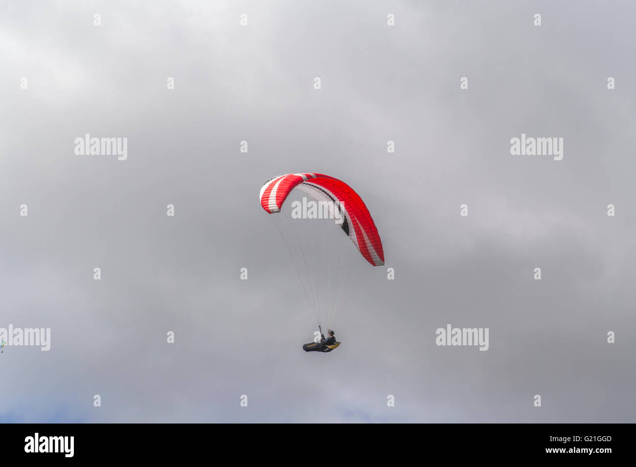 Pilot flying a paraglider at Parlick Pike, Ribble Valley, Lancashire ...
