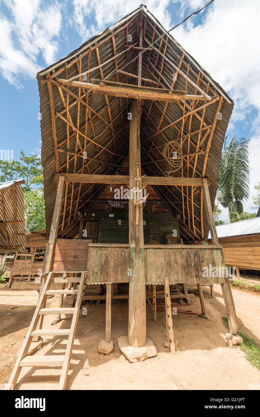 Outstanding and unique local architecture, wooden buildings with boat ...