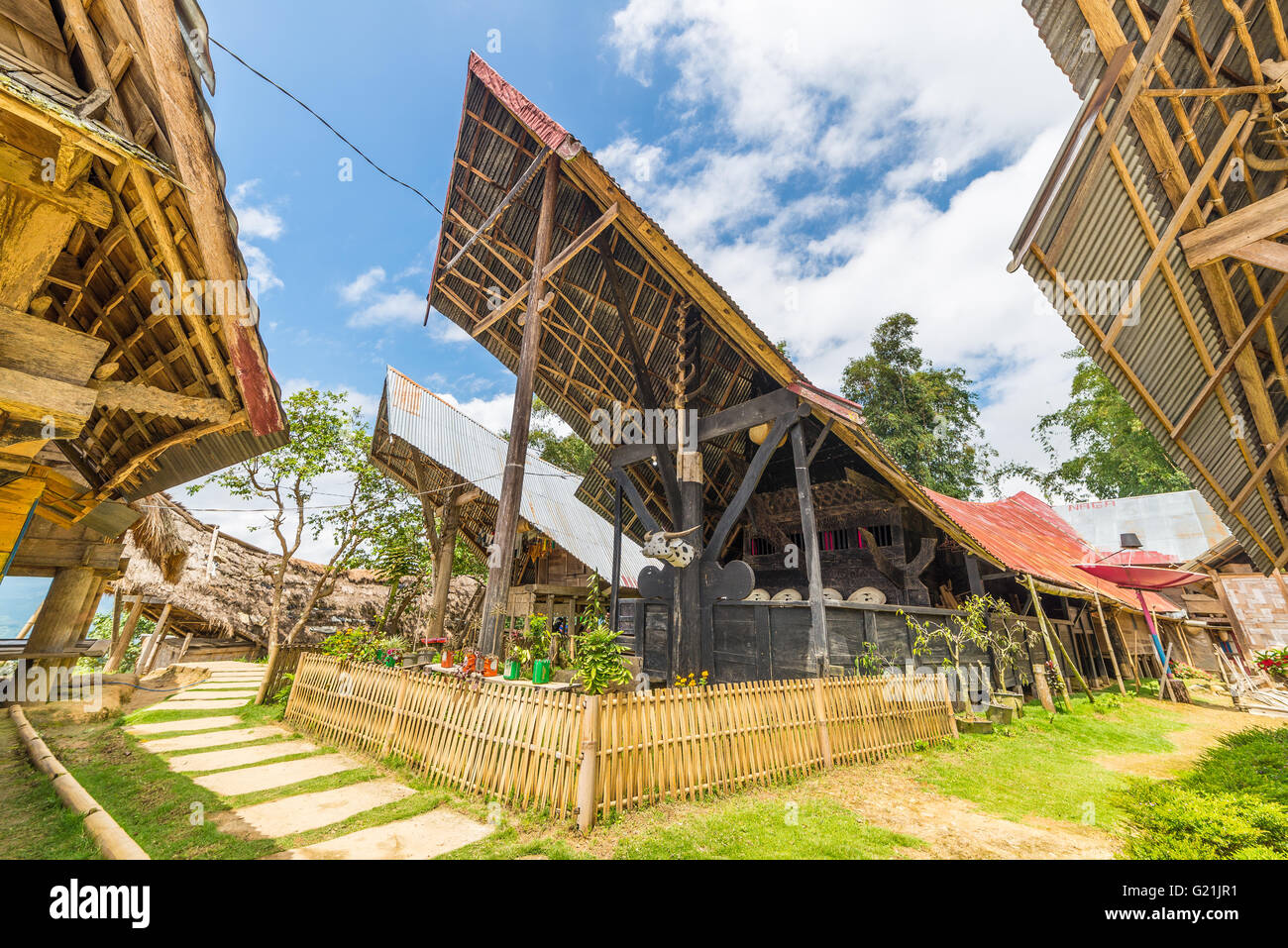 Outstanding and unique local architecture, wooden buildings with boat ...