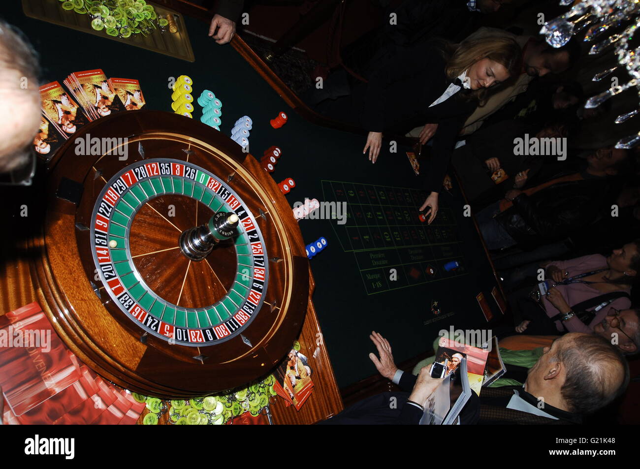 Gambling at roulette table Stock Photo - Alamy