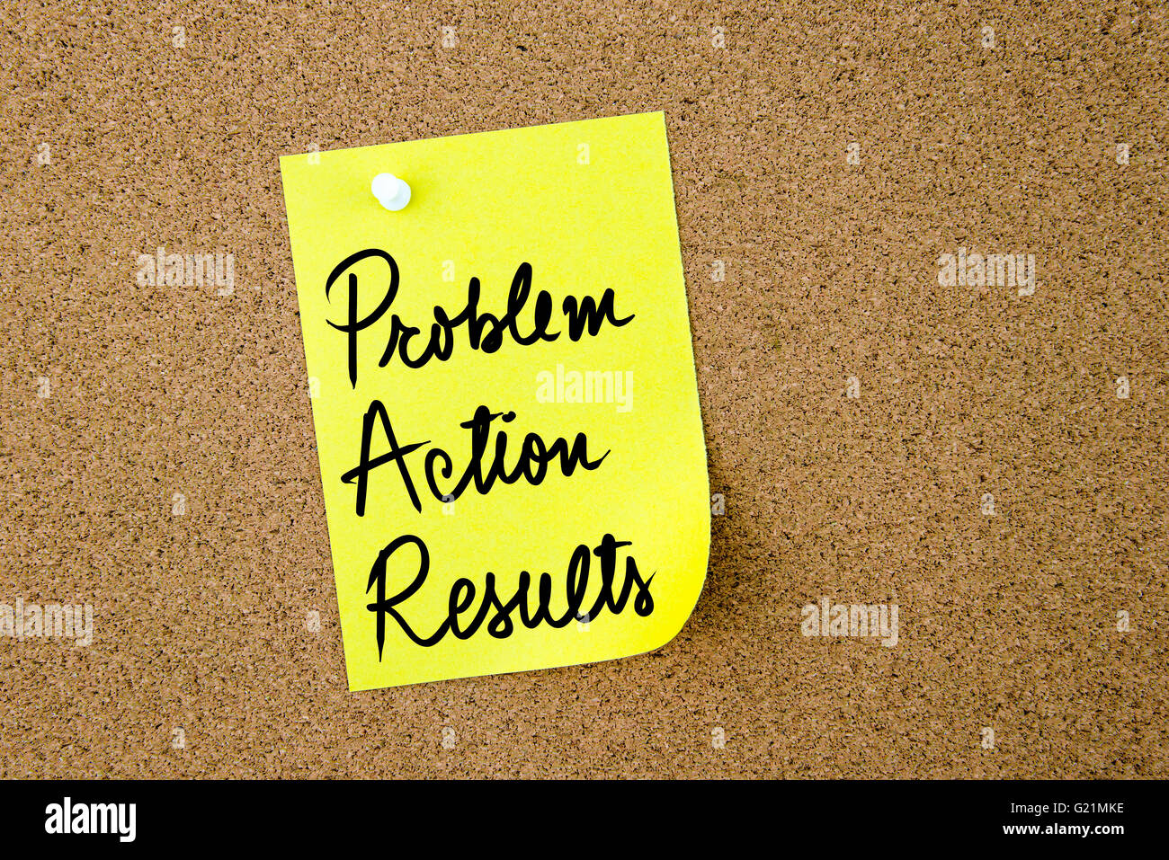 Problem Action Results written on yellow paper note pinned on cork ...
