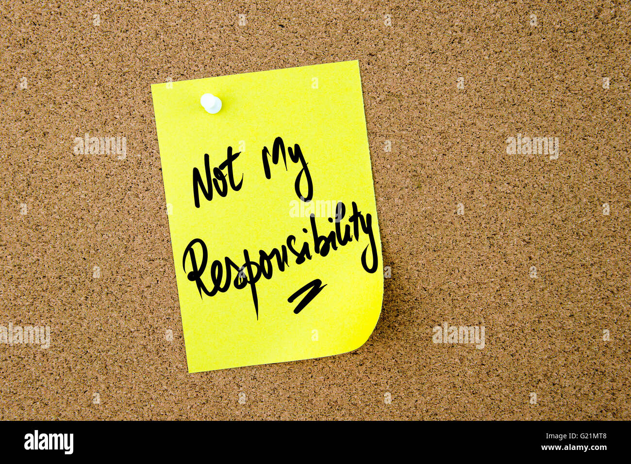 Not My Responsibility written on yellow paper note pinned on cork board ...