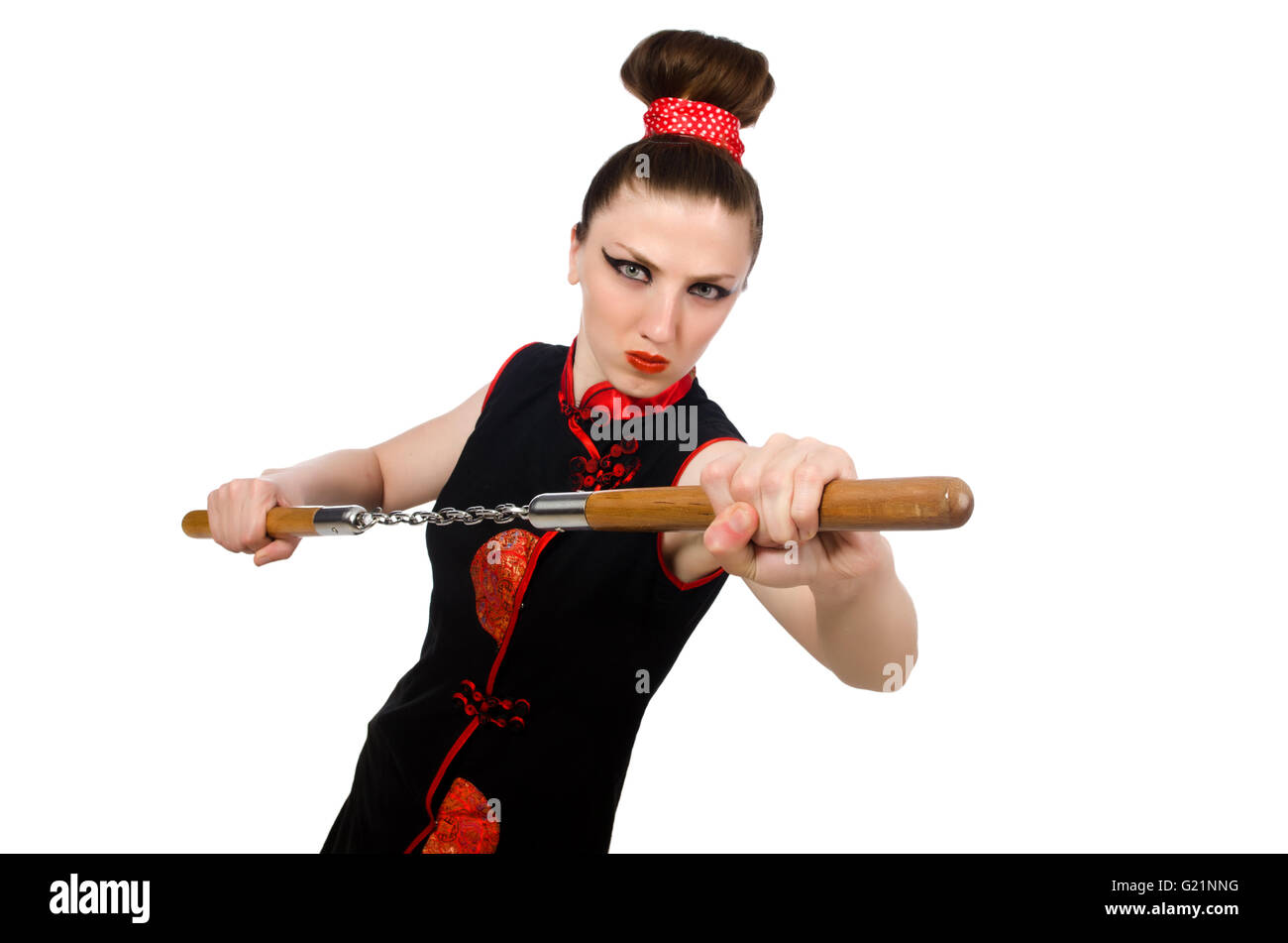 Funny woman with nunchucks isolated on white Stock Photo - Alamy