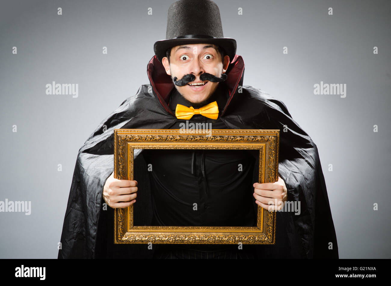 Funny man with picture frame Stock Photo - Alamy