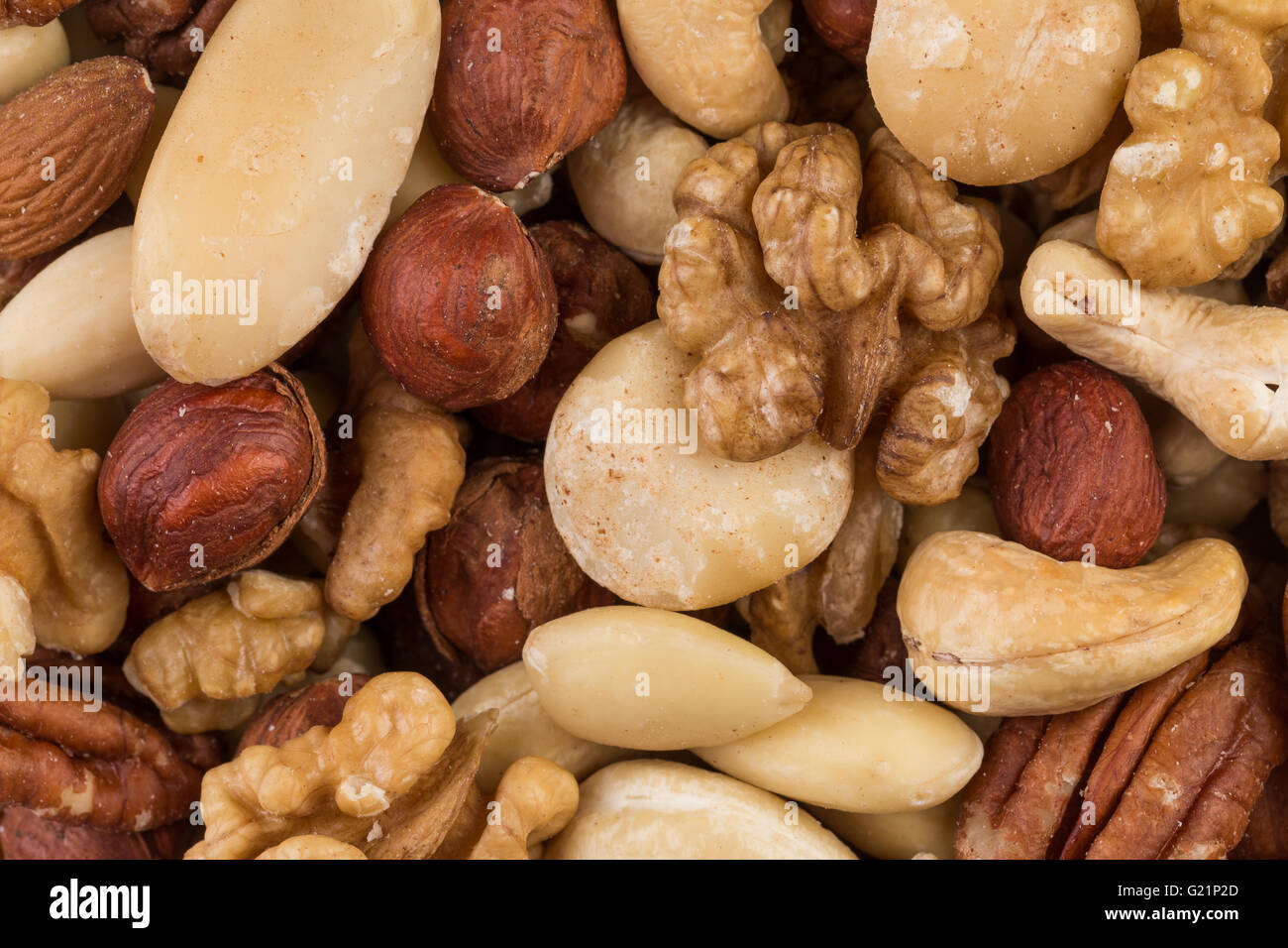 lot of different types of nuts mix for background Stock Photo - Alamy