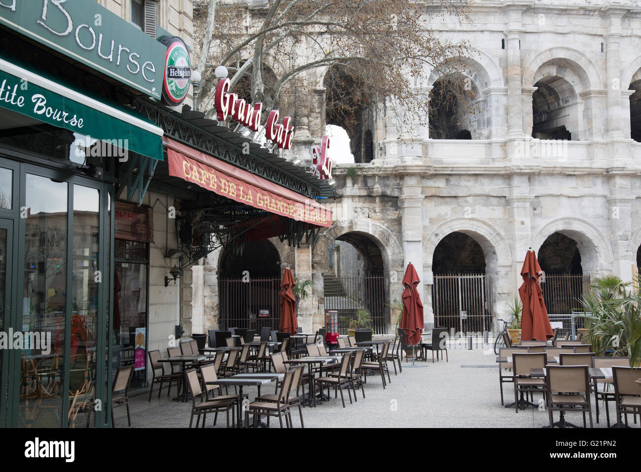 Roman Amphitheatre and Grand Bourse Cafe, Nimes, France Stock Photo - Alamy