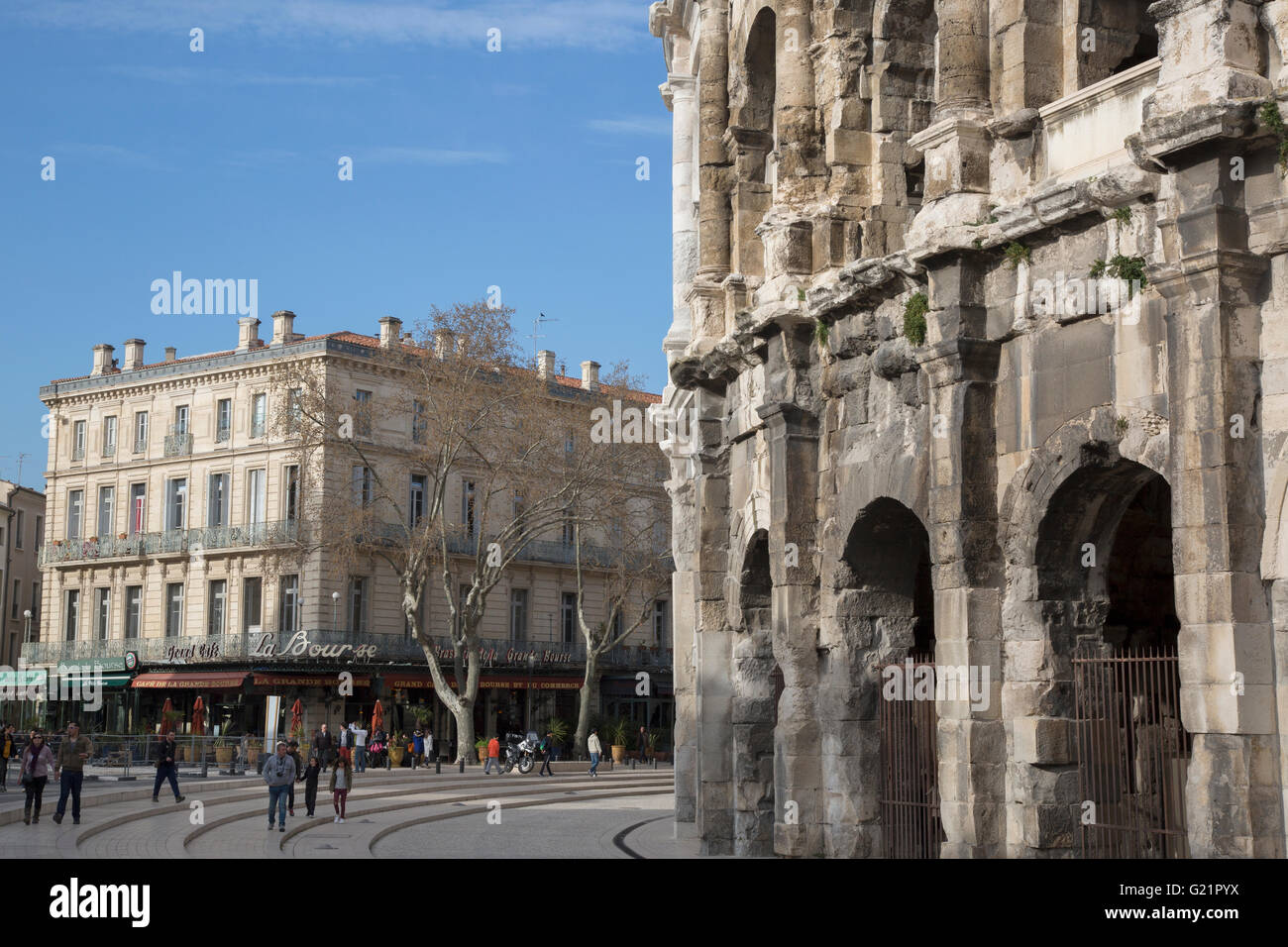 Roman Amphitheatre and Cafe Bourse, Nimes, France, Europe Stock Photo ...