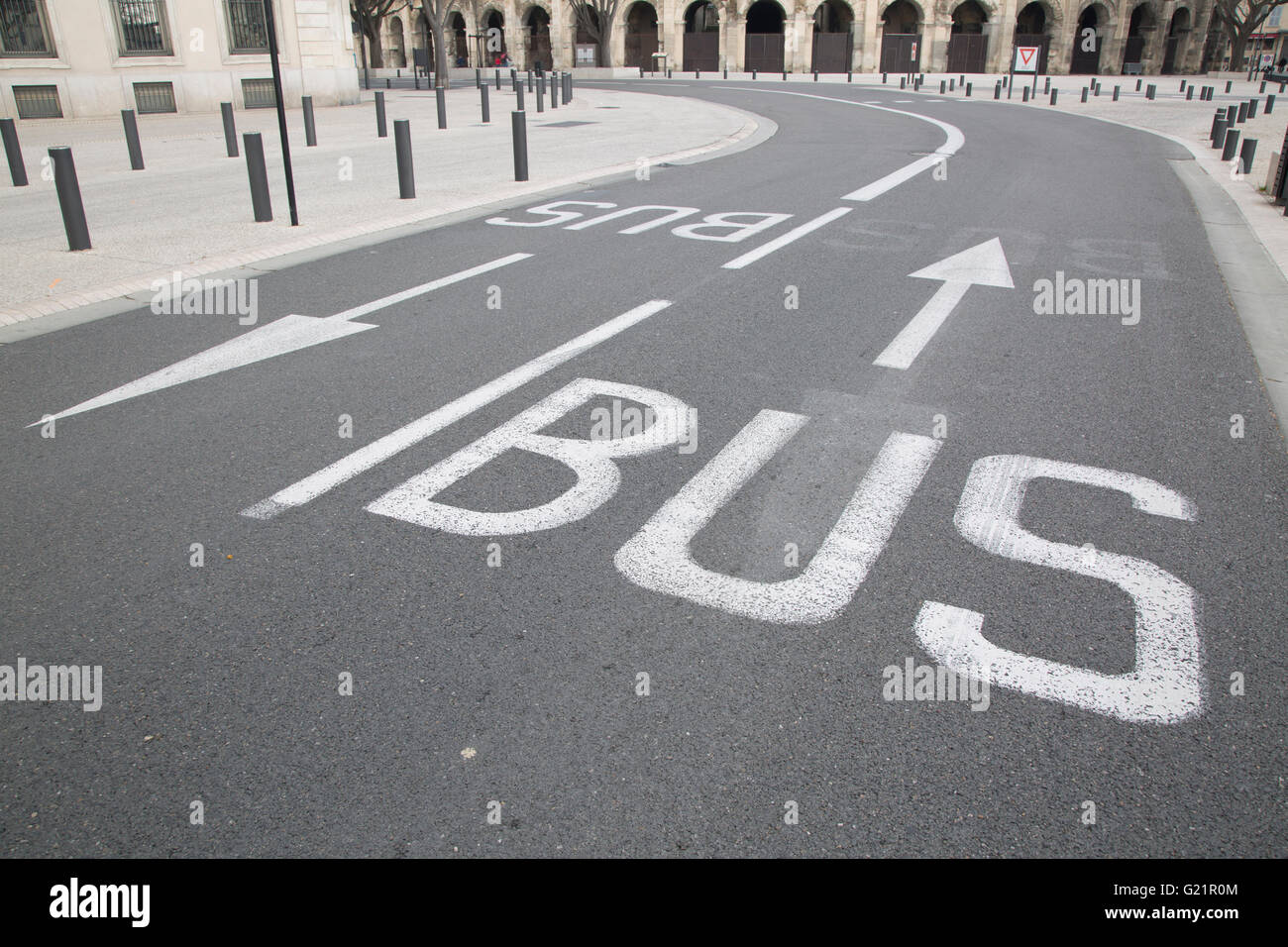 Bus Lane Arrow in Urban Setting Stock Photo - Alamy