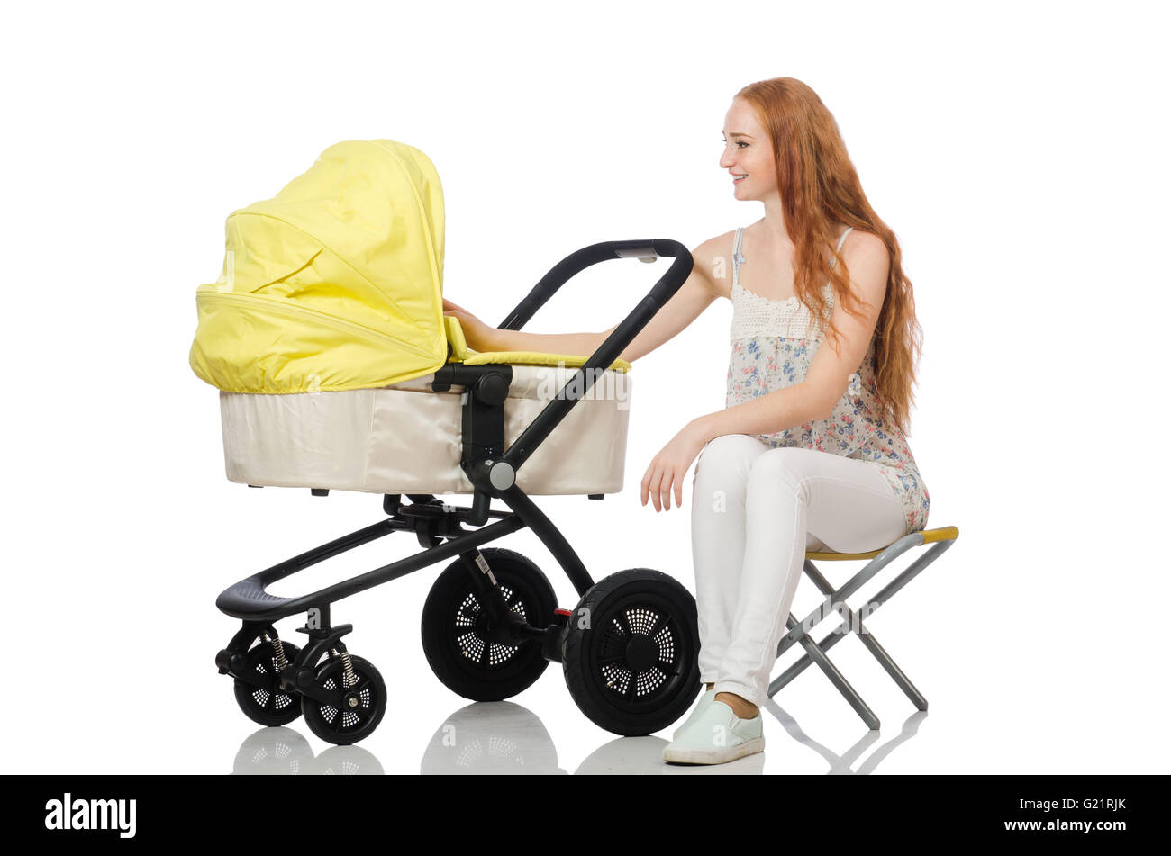 Woman with baby and pram isolated on white Stock Photo - Alamy