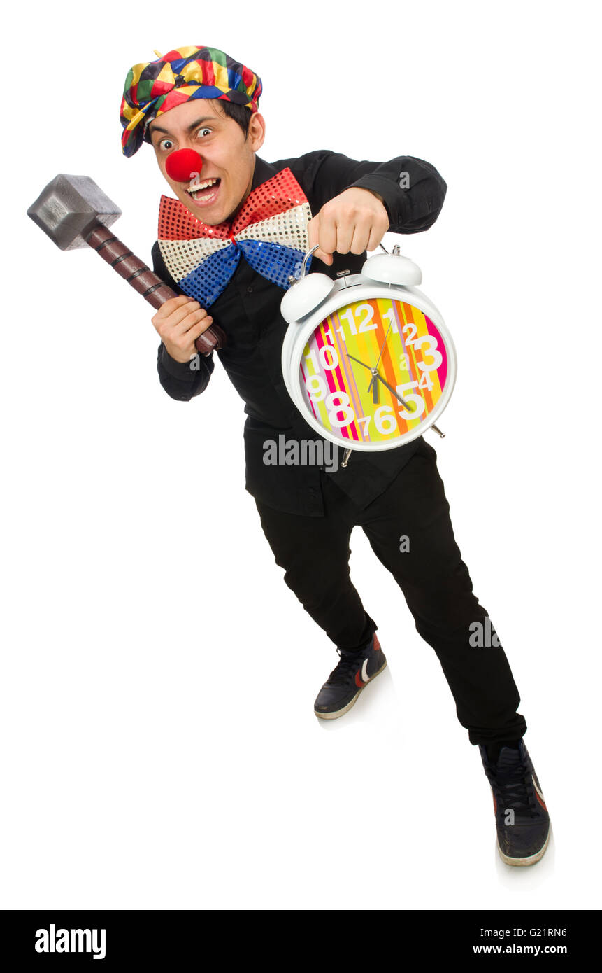 Funny clown with hammer and clock on white Stock Photo - Alamy